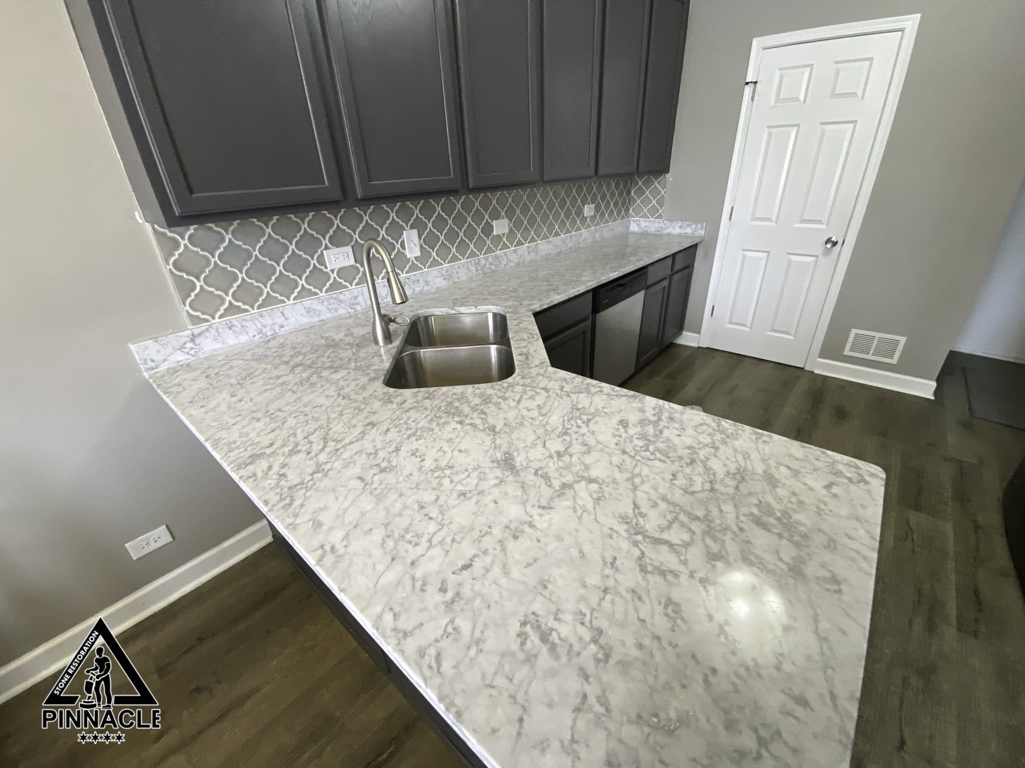 White Marble Countertop Restoration - Pinnacle Stone Restoration